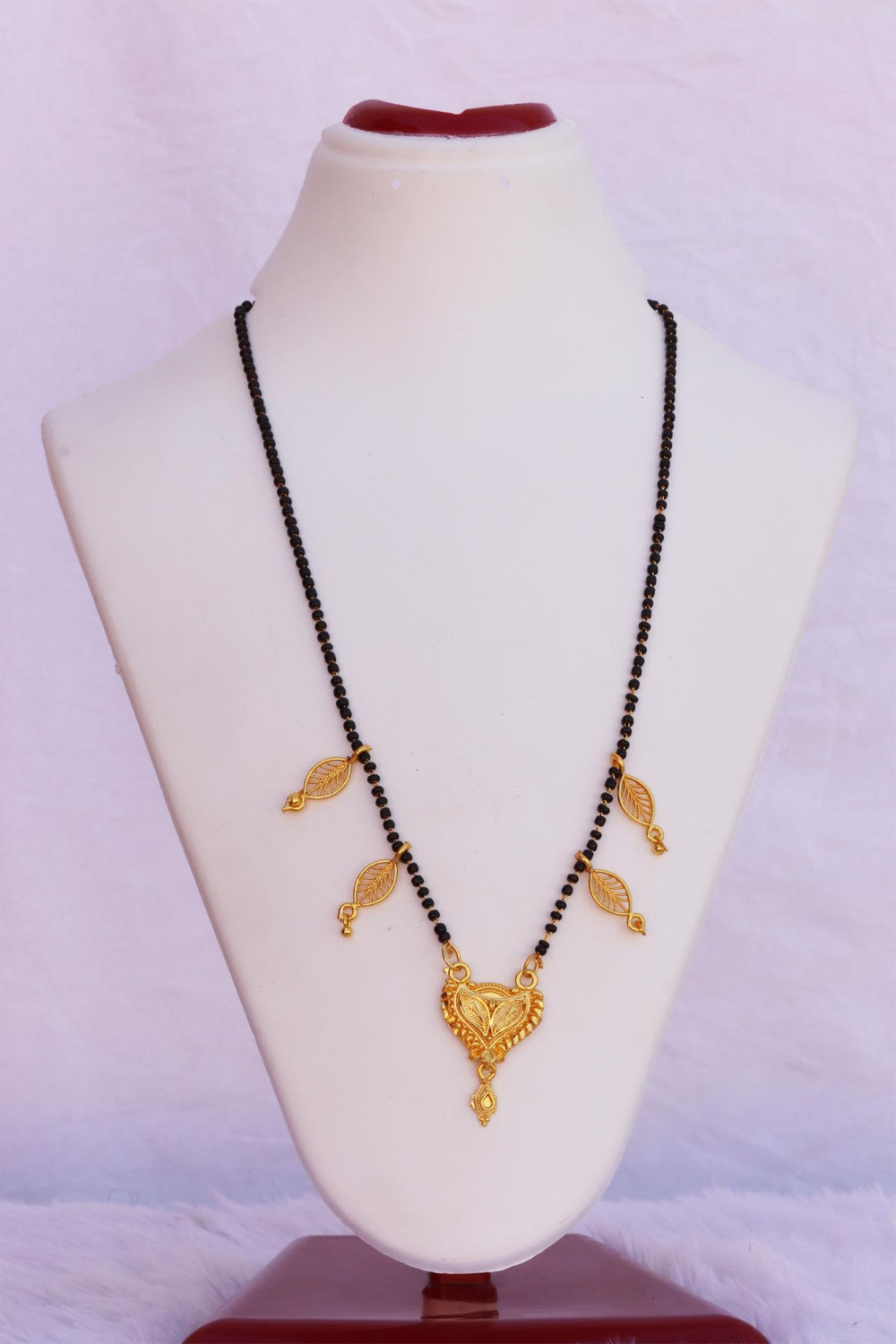 Buy Elegant Combination of Golden Mangalsutras at joolkart.com